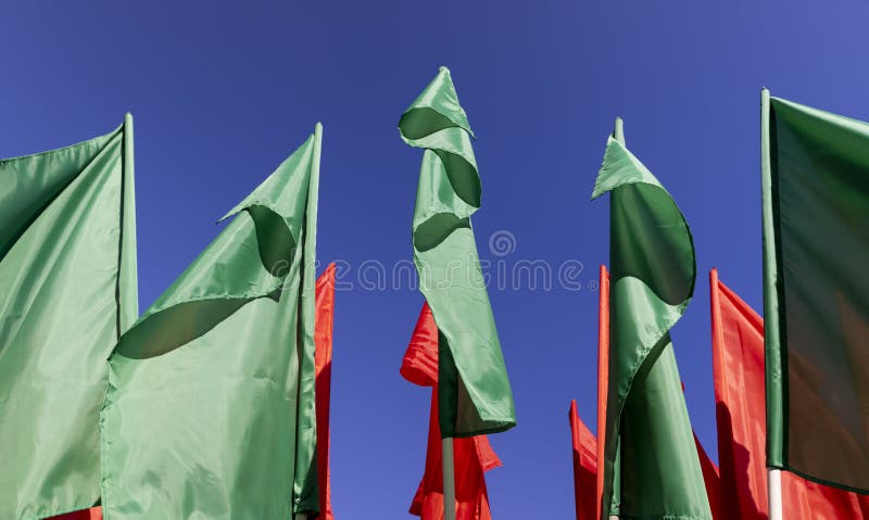 Green Flags Set Up during the Celebration in Windy Weather Stock Image ...