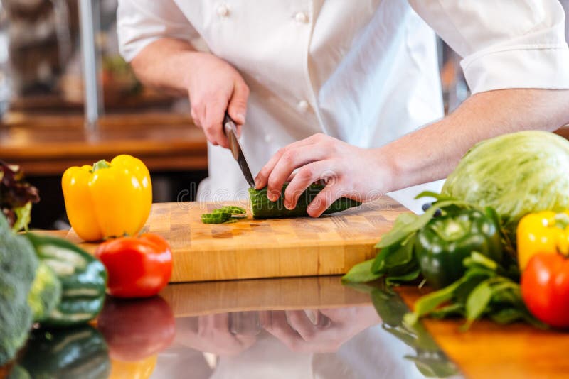 Green Fresh Cucumber Cut by Hands of Professional Chef Cook Stock Image ...