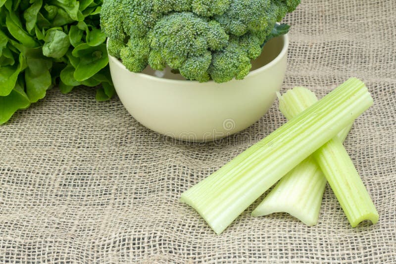 Green Fresh Vegetables. Whole Broccoli in a Bowl with Lettuce and ...