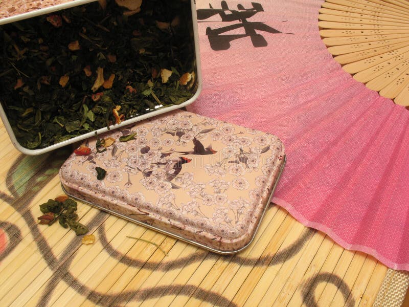 Green Fruit Tea in Tin and Chinese Fan Stock Image - Image of taste ...