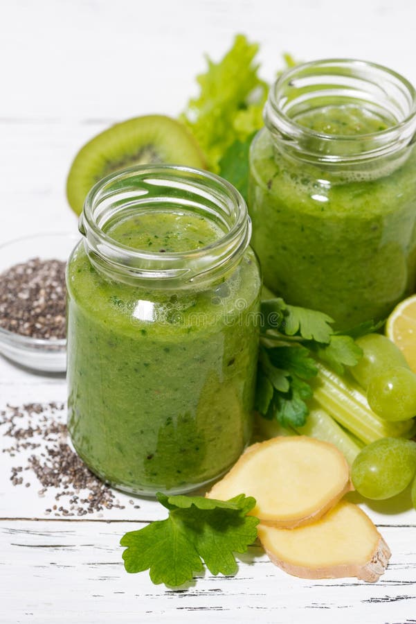 Green Fruit and Vegetable Smoothies in Jars, Vertical Top View Stock ...