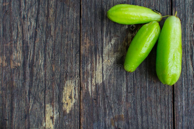 Green fruit on wood. stock photo. Image of copy, empty - 87426166