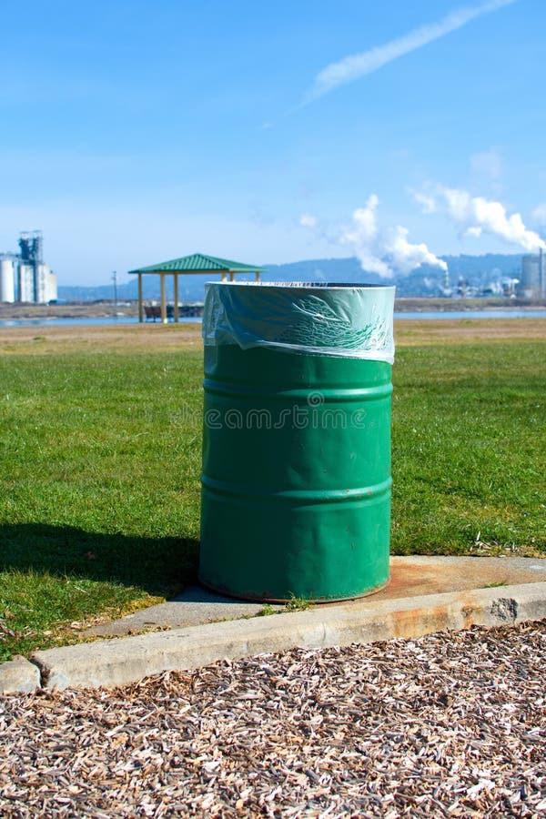 Green Garbage Can Along Walking Path Stock Photo - Image of environment ...