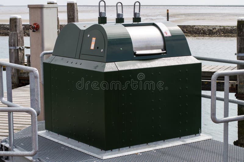 Green Garbage Container in a Harbor for Boat Waste Stock Image - Image ...