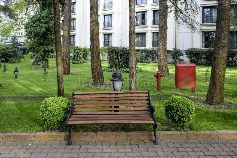 A Nice Resting Place in the Garden Stock Photo - Image of path, meadow ...