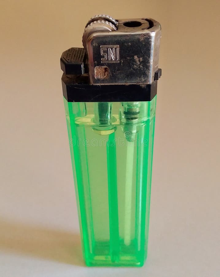 Green Gas Lighter on the Floor Editorial Stock Photo - Image of small ...