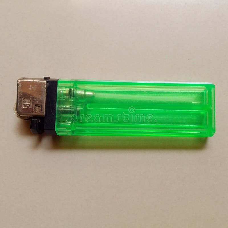 Green Gas Lighter on the Floor Editorial Photo - Image of floor ...