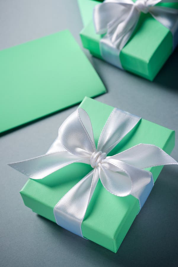 Green Gift Boxes with a White Ribbon Stock Photo - Image of jewelry ...