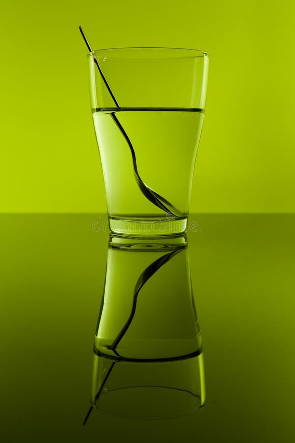 Glass of water and spoon stock image. Image of drink - 24492771