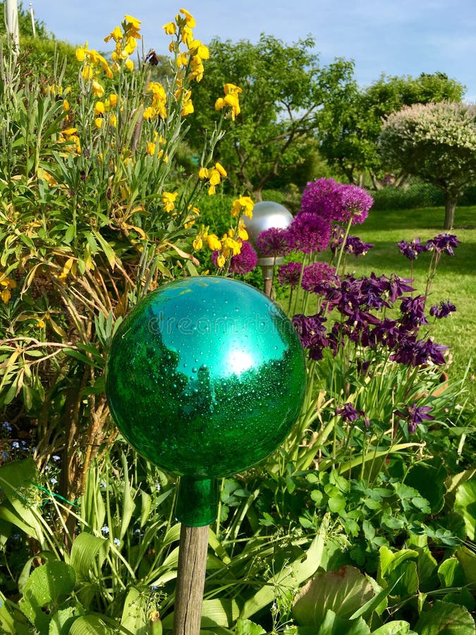 Green glass ball stock image. Image of road, colorful - 73698289