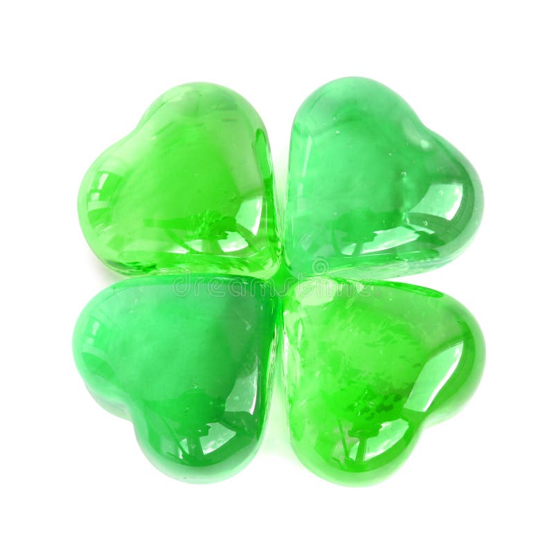 Green Glass Four Leaf Clover Shape Stock Photo - Image of glossy, white ...