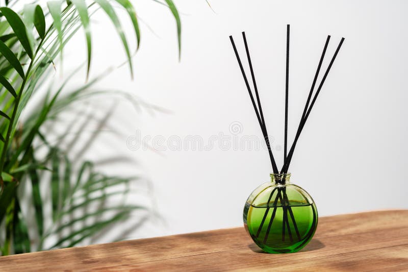Green Glass Reed Diffuser Wooden Tabletop Greenery Background Stock ...