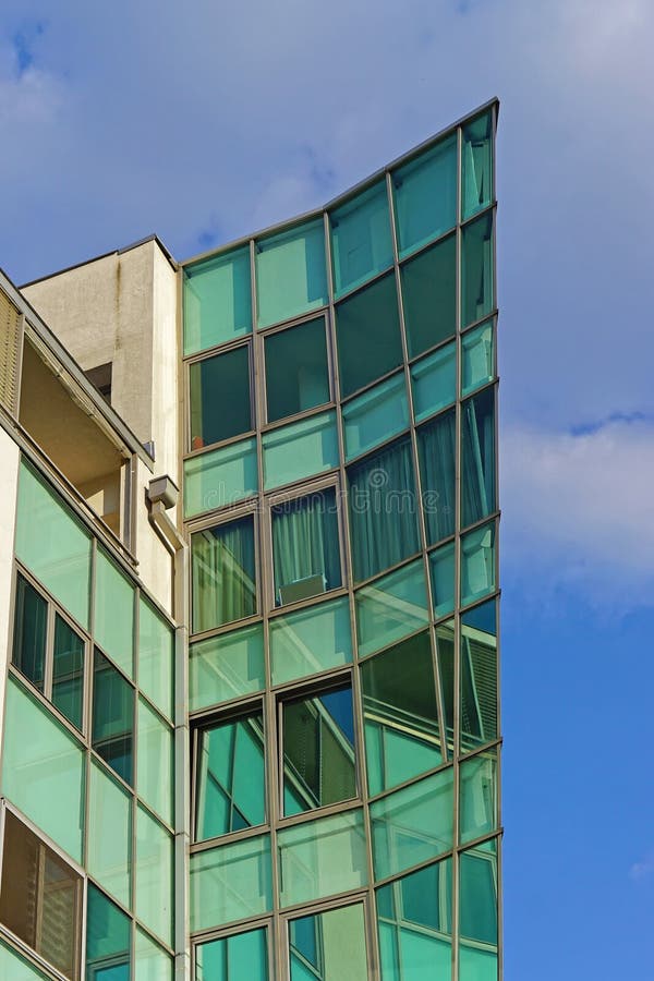 Green glass skyscraper stock image. Image of architecture - 201208639