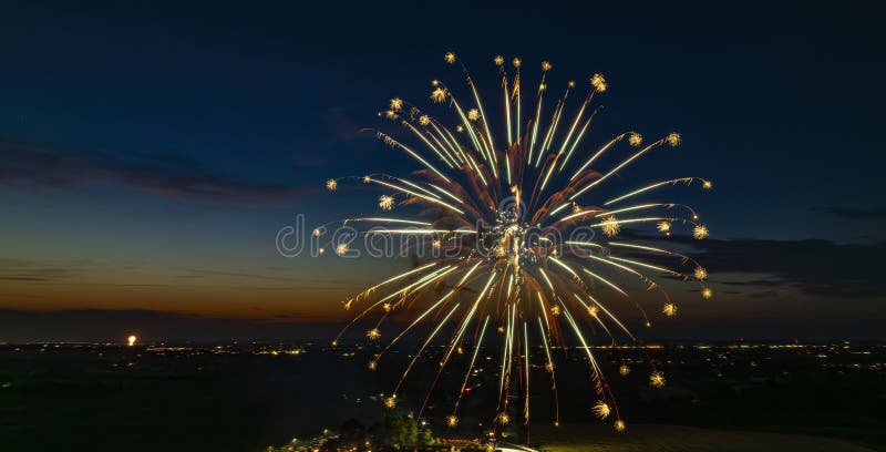 Green and Gold Fireworks Exploding in the Night Sky, Creating Stunning ...