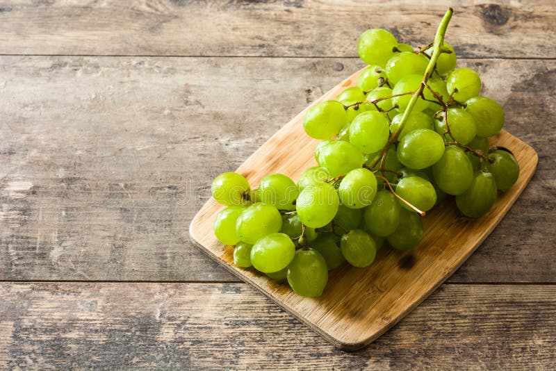 Green Grapes on Wooden Table. Stock Photo - Image of grapes, summer ...