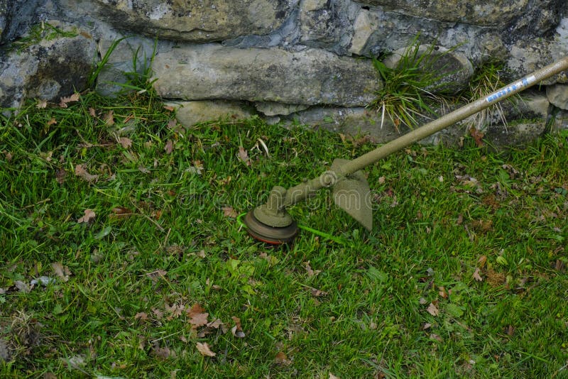 Green Grass Cutting Equipment Tool. Cutting Garden Tools Close-up Stock ...