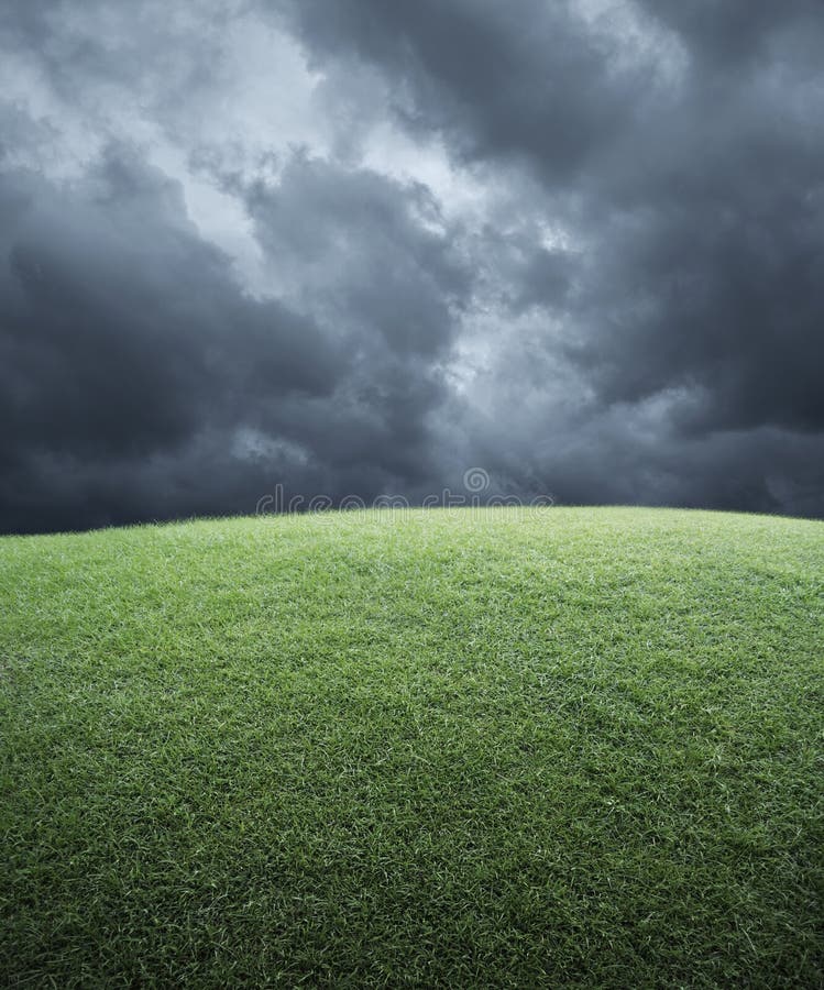 Green Grass Field with Dark Storm Clouds Stock Photo - Image of rain ...
