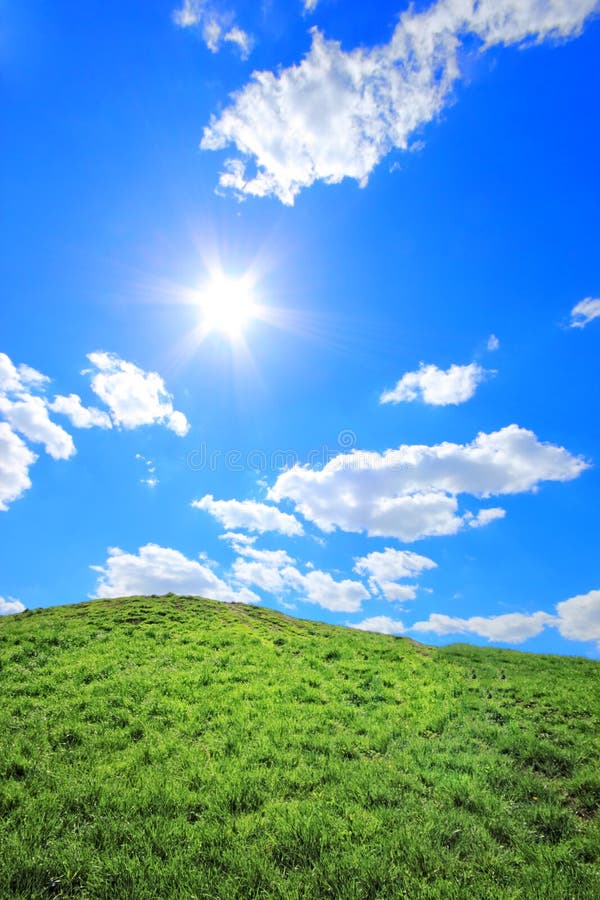 Green Grass Hills Under Midday Sun Stock Photo - Image of grass ...
