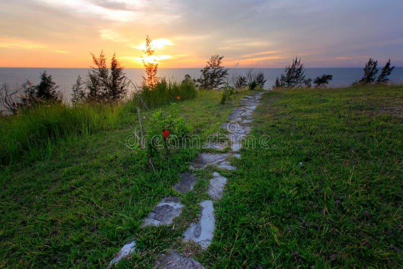 Green Grass and Stone Path with Sunset Stock Image - Image of clouds ...