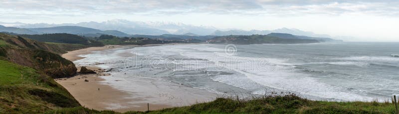 Green Grassy Cliffs Drop Down To the Ocean Coast and a Large Beautiful ...