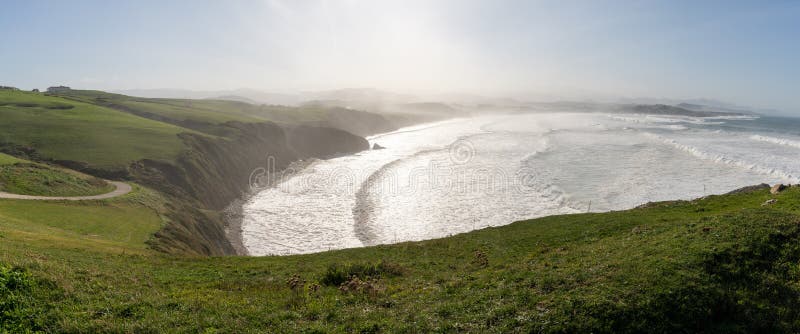 Green Grassy Cliffs Drop Down To the Ocean Coast in Northern Spain ...
