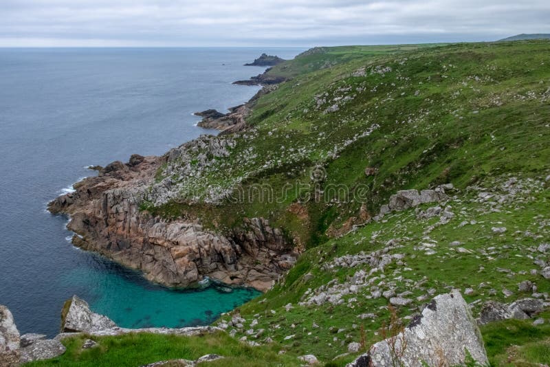 Grassy Cliffs Overlooking the Sea Stock Photo - Image of partially ...