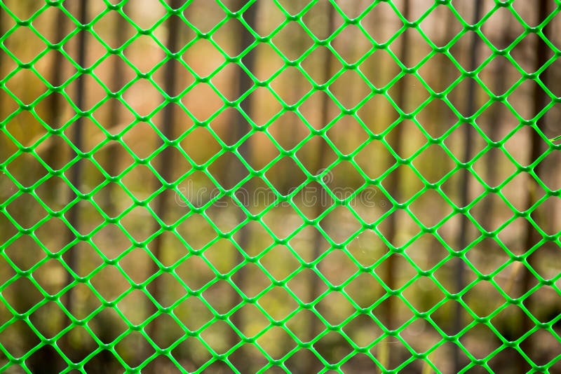 Green Grid on the Fence As a Background Stock Image - Image of fence ...