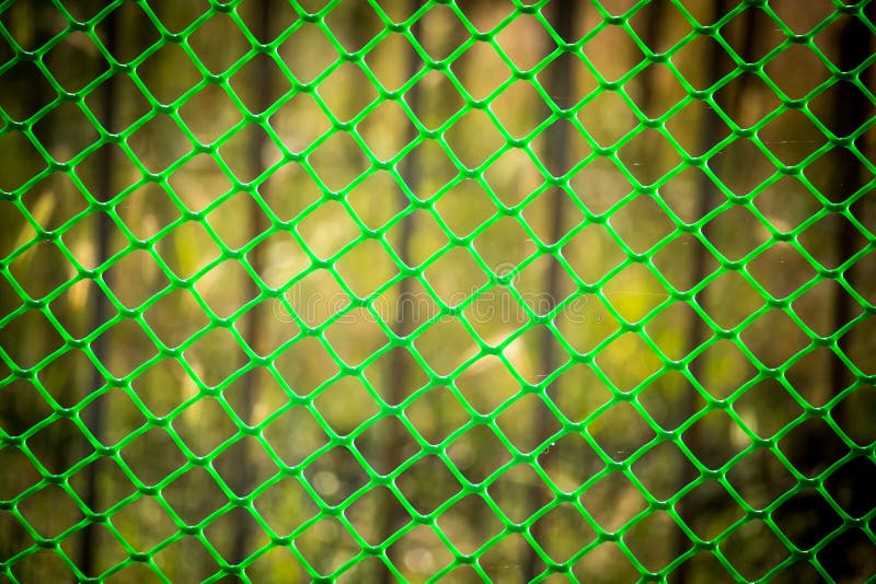 Green Grid on the Fence As a Background Stock Photo - Image of steel ...