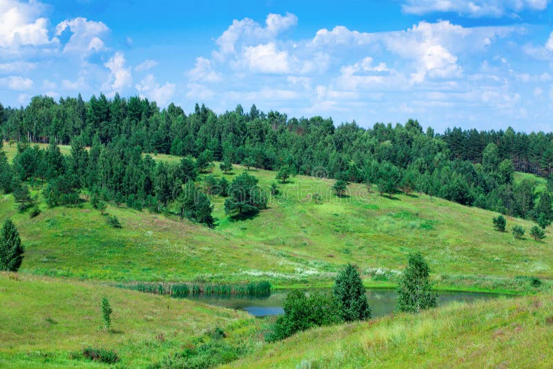 Green Hills and Trees on Blue Sky Background Stock Photo - Image of ...