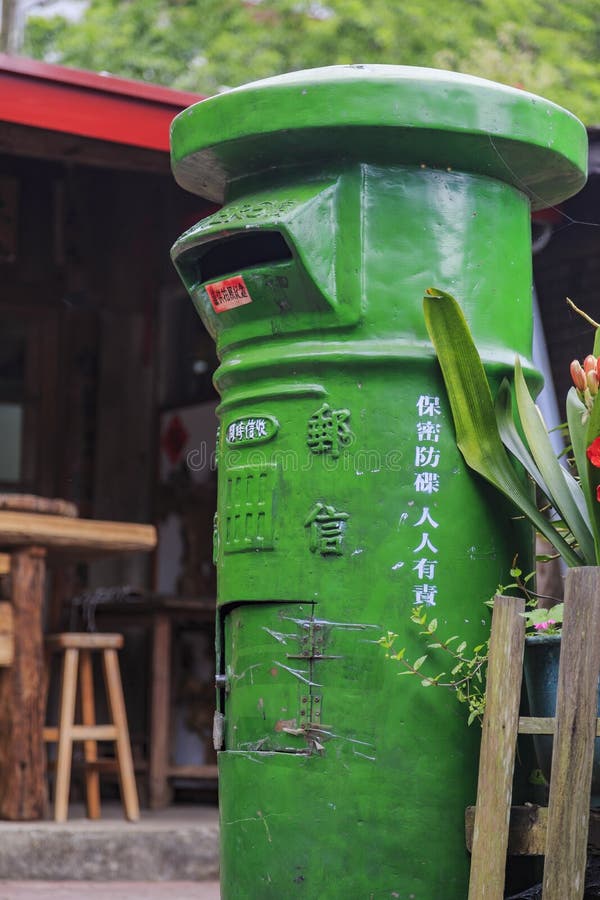 Green historical post box editorial stock photo. Image of post - 98462223