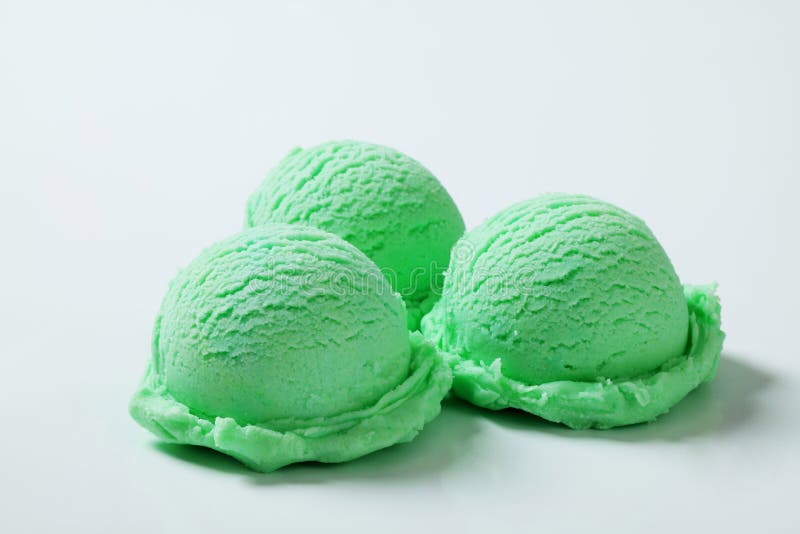 Green ice cream scoops stock photo. Image of food, light - 369839780