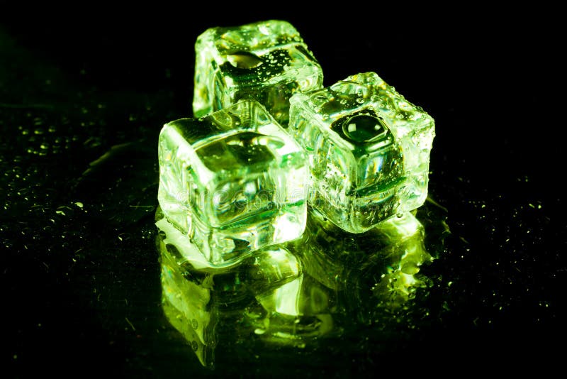 Green Ice Cubes Reflection on Black Table Stock Photo - Image of bright ...