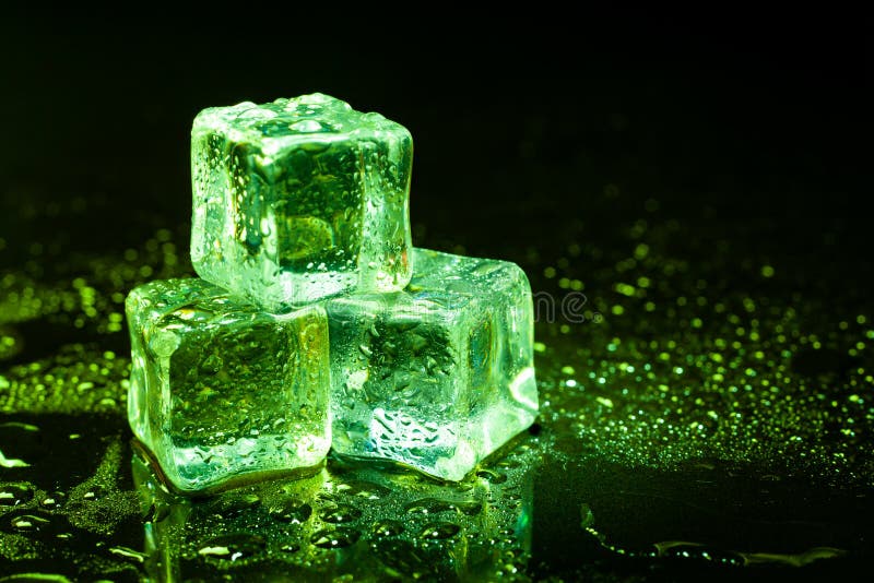 Green Ice Cubes Reflection on Black Table Stock Photo - Image of bright ...