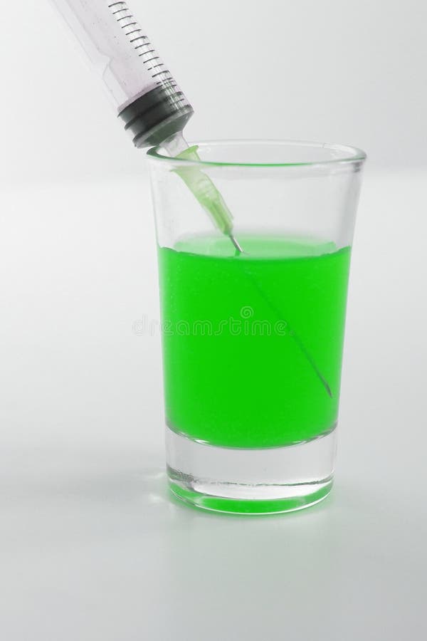 Green Injection. Syringe on a White Background. Stock Image - Image of ...