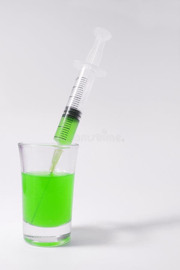 Green Injection. Syringe on a White Background. Stock Image - Image of ...