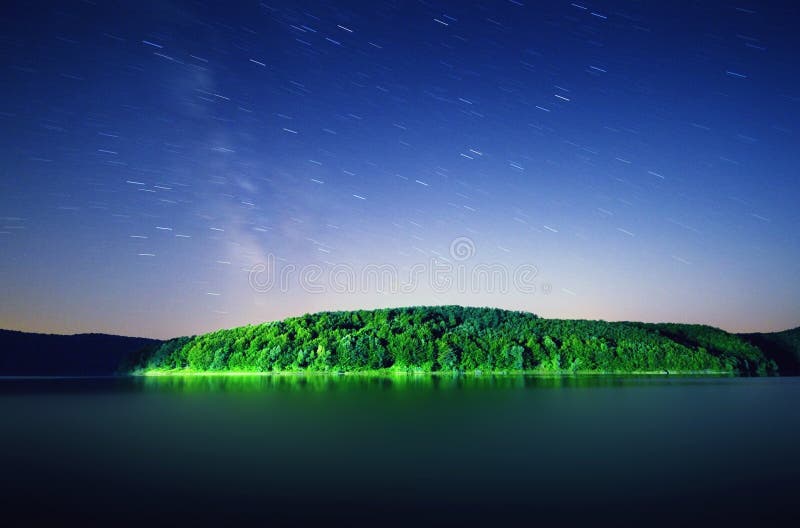 Green island at night stock photo. Image of nature, night - 11157768