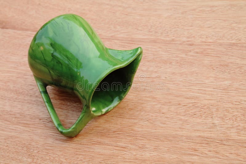 Green Jug Fall on Wooden Floor Stock Photo - Image of studio, ceramic ...