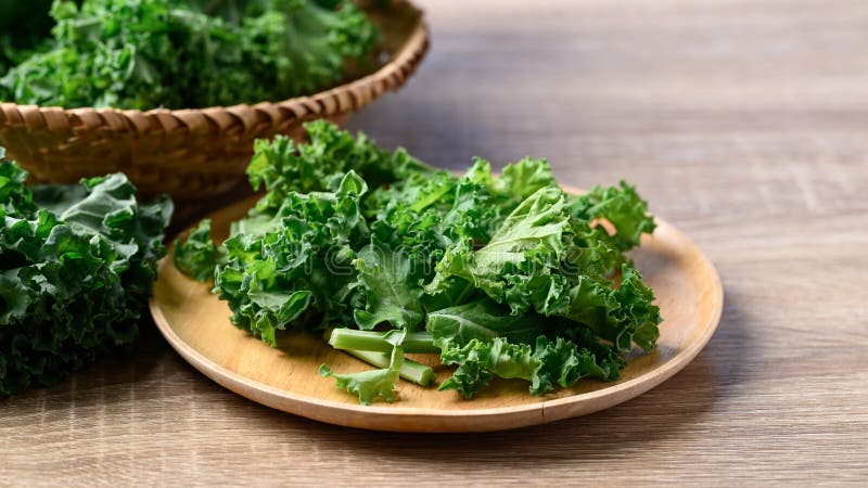 Green Kale or Leaf Cabbage on Wooden Plate Stock Photo - Image of ...