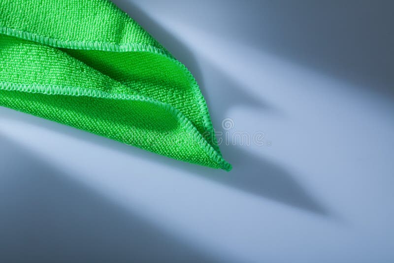 Green Kitchen Dishwashing Cloth on White Surface Stock Photo - Image of ...
