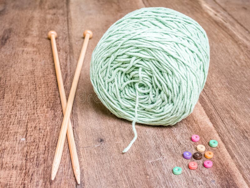 Green Knitting Yarn on Wooden Background Stock Image - Image of close ...