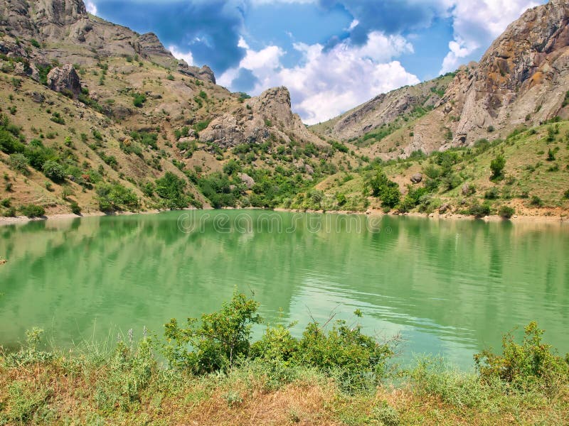 Green lake stock photo. Image of cloudy, ridge, ecology - 21983552