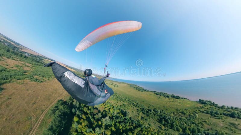 A Person is Flying the Parawing in a Top View Stock Footage - Video of ...