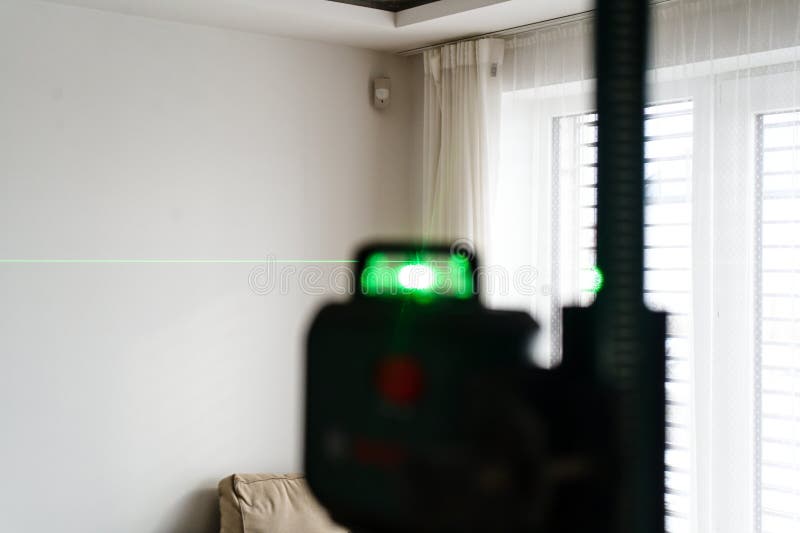 Green Laser Level Projecting Alignment Line in Interior Renovation ...
