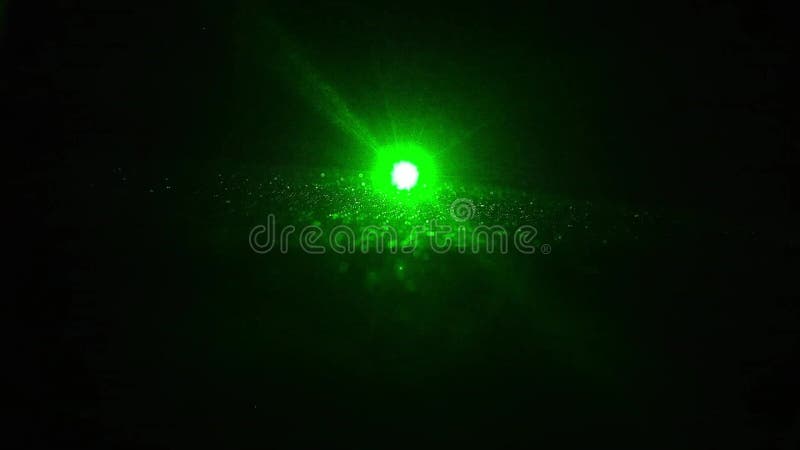 A Green Laser Light Directly into the Camera Stock Video - Video of ...