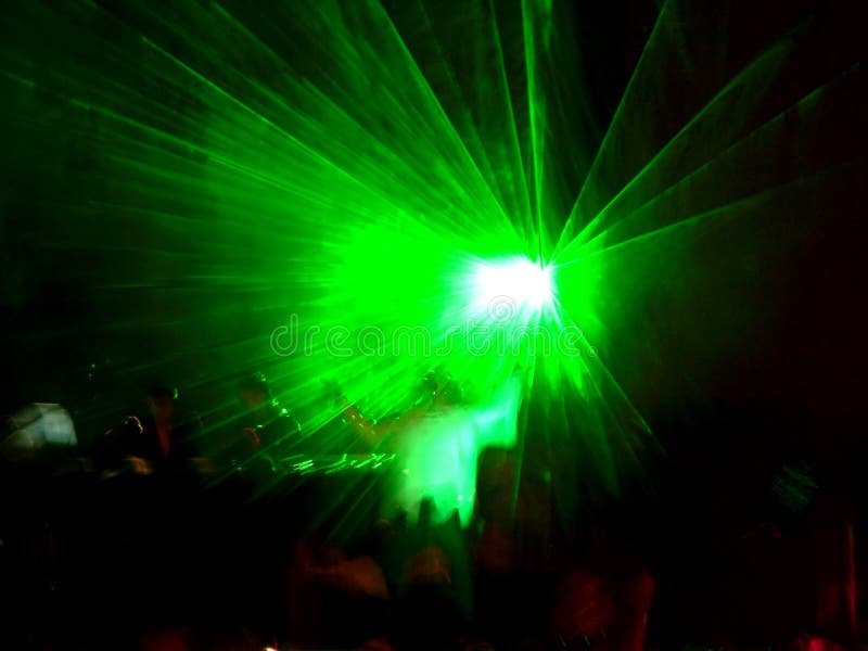 Silhouettes of Dancing People in Green Laser Light Stock Photo - Image ...