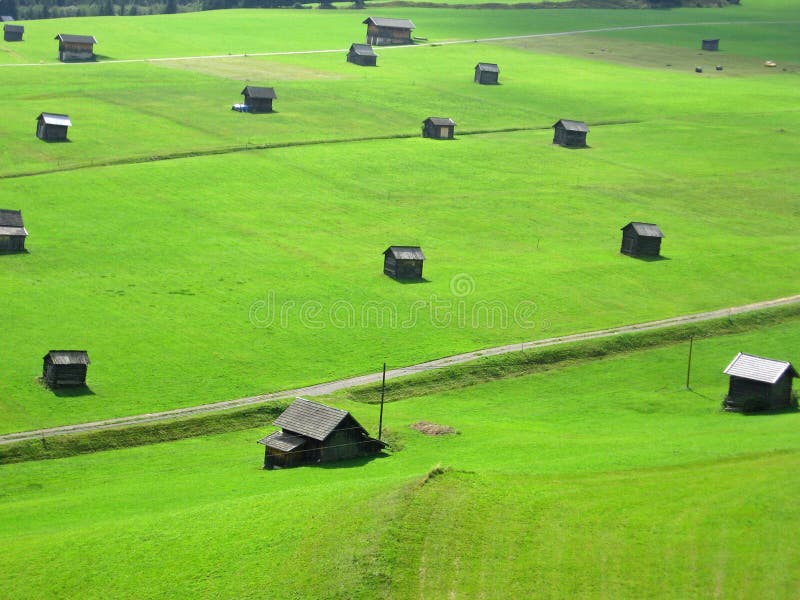 Green Lawn with Small Barns Austrian Stock Image - Image of barn ...