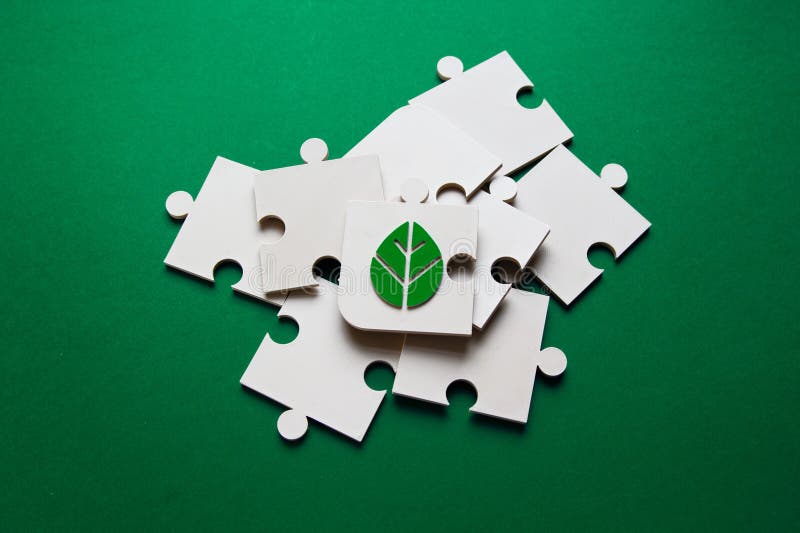 Green Leaf Puzzle Piece among White Pieces. Stock Photo - Image of ...