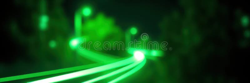 Green Light Trails Illuminate a Winding Path in a Nighttime Urban ...