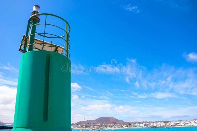 Green Lighthouse Sits on Shoreline Stock Image - Image of spain ...