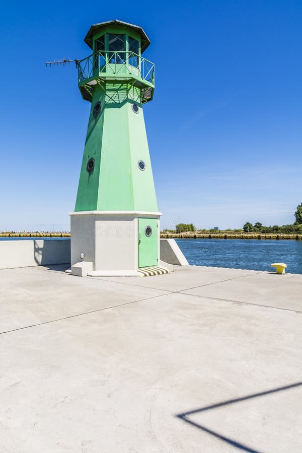 Green Lighthouse on the Waterfront. Stock Photo - Image of light ...
